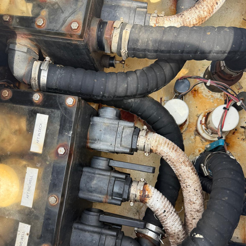 Marine pump system with visible corrosion on metal components